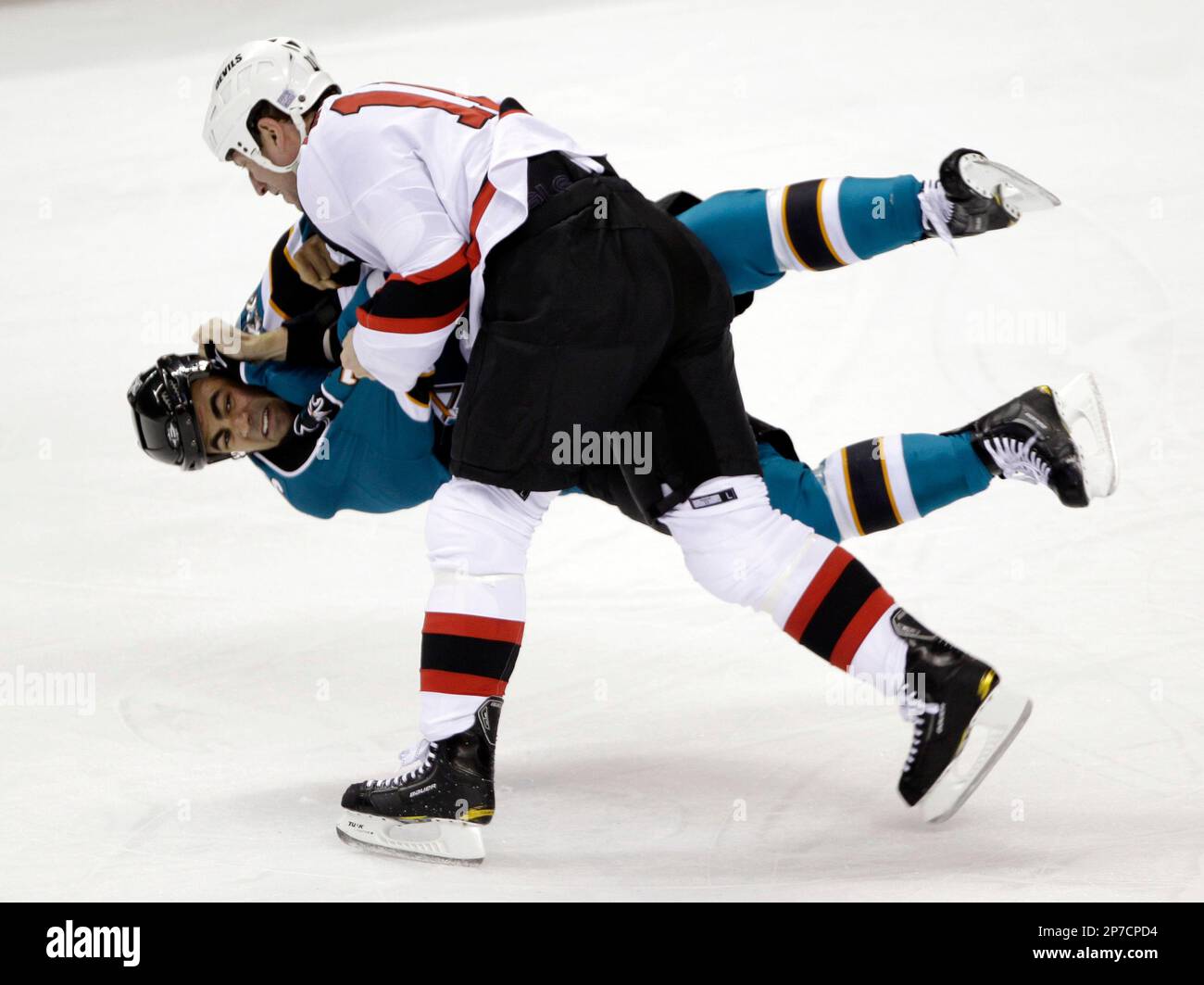 New Jersey Devils center Adam Mair knocks down San Jose Sharks center ...