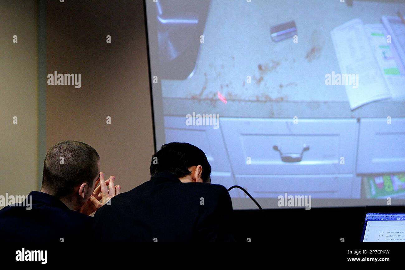 Steven Spader, left, and attorney Andrew Winters sit at the defendant's ...
