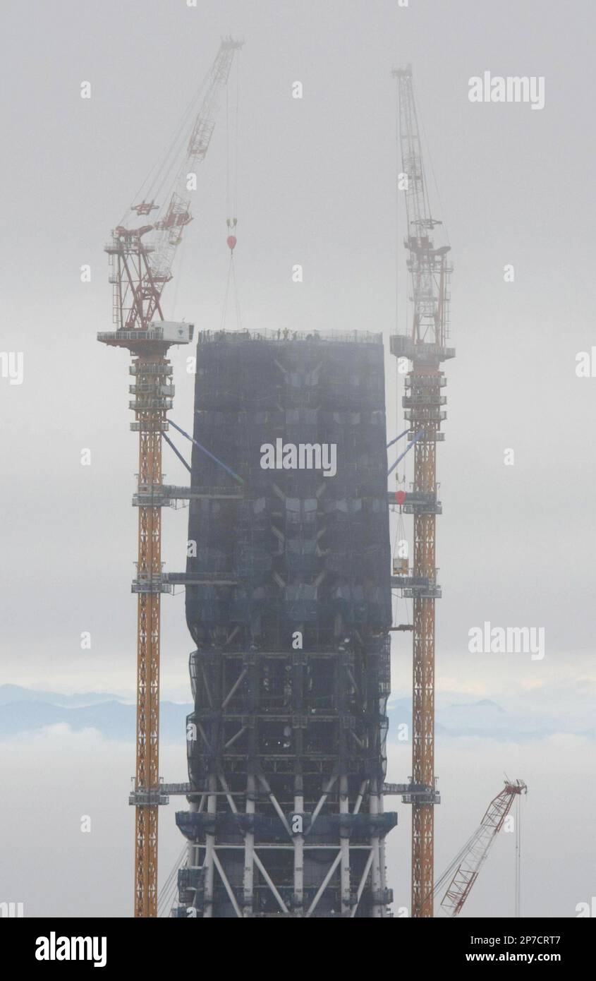 Tokyo Sky Tree Tower has reached to a height of 497-meter on Monday ...