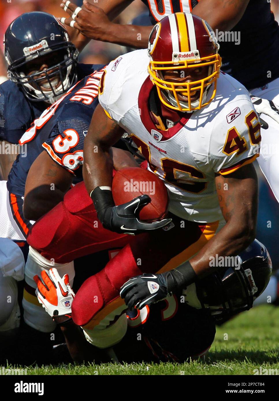 Washington Redskins running back Ryan Torain (46) is tackled by Chicago ...