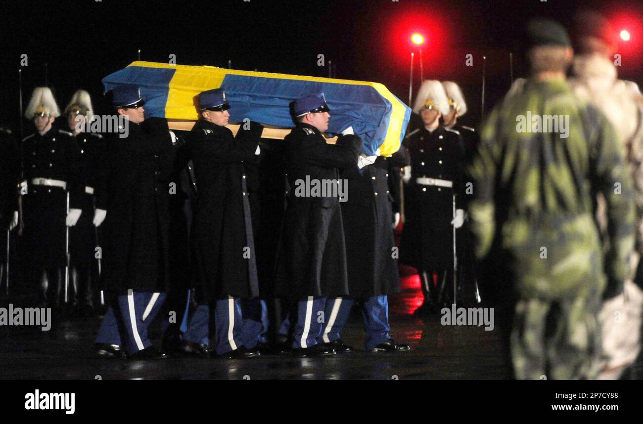 The coffin of Kenneth Wallin, killed in action on an ISAF mission in ...