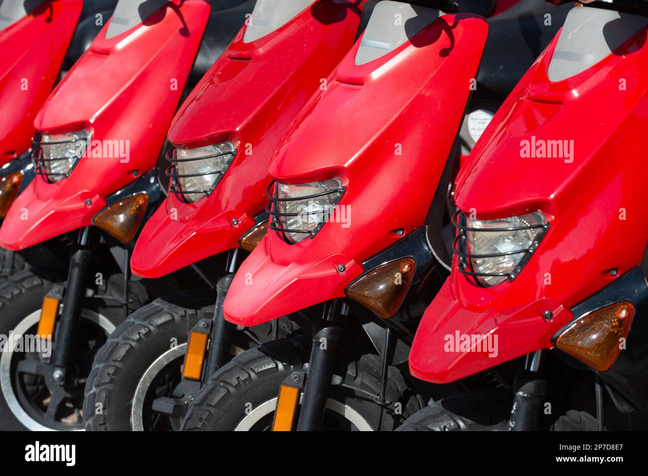 image of parked rental moped on parking. parked rental moped in row ...