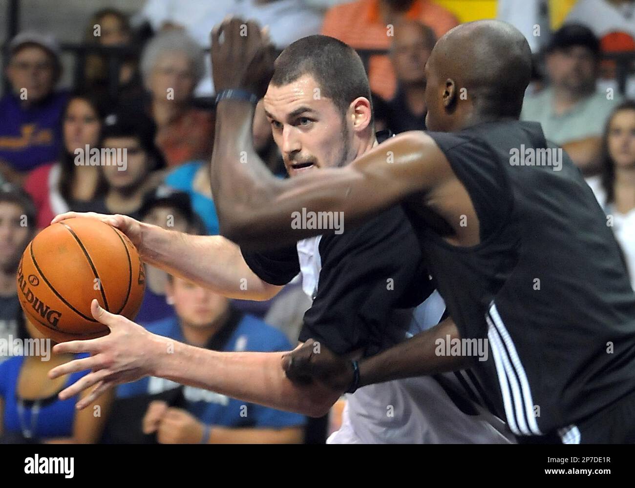 Minnesota Timberwolves' Kevin Love drives the lane during the NBA ...
