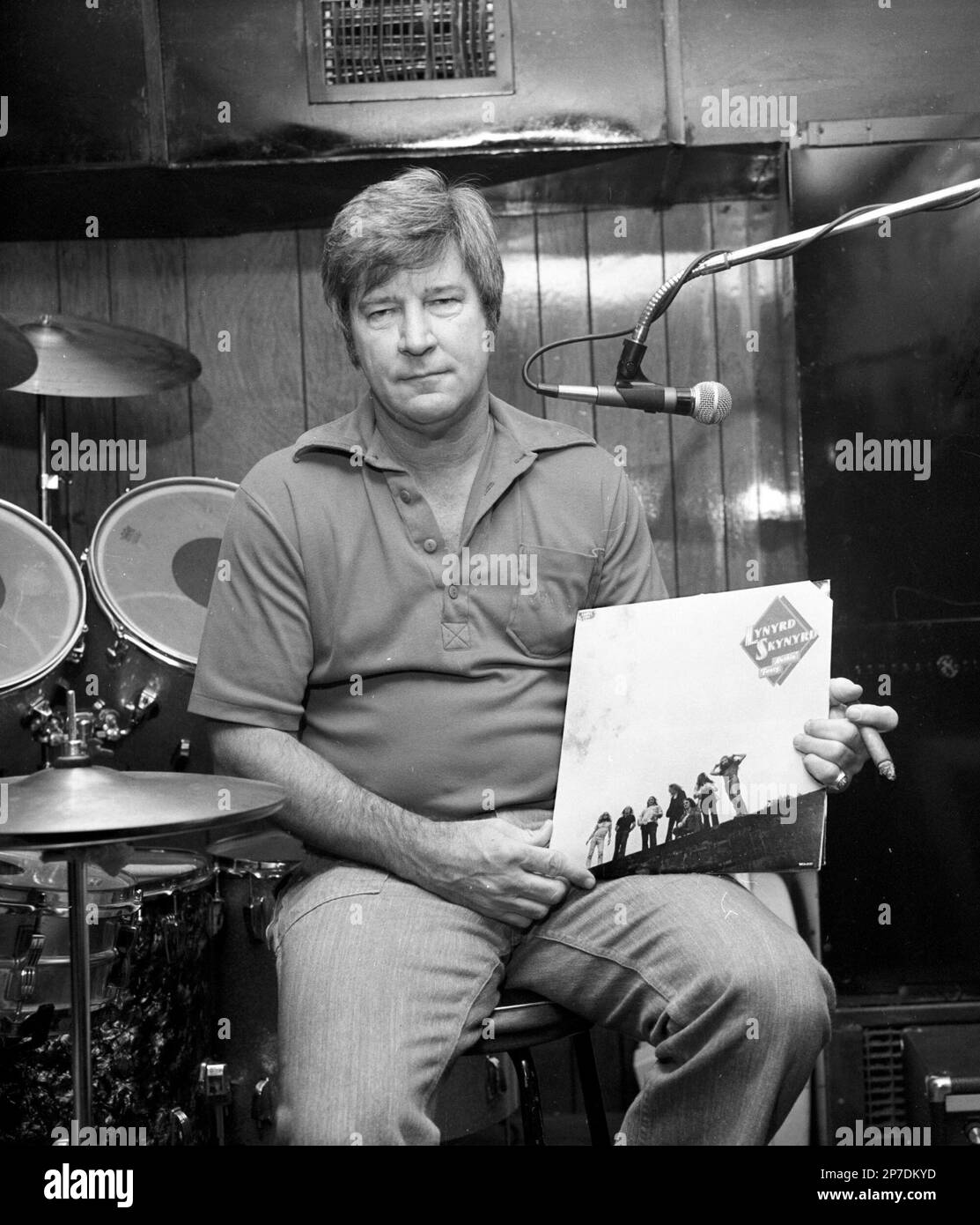 In this undated photo, Leonard Skinner holds Lynyrd Skynyrd's album ...