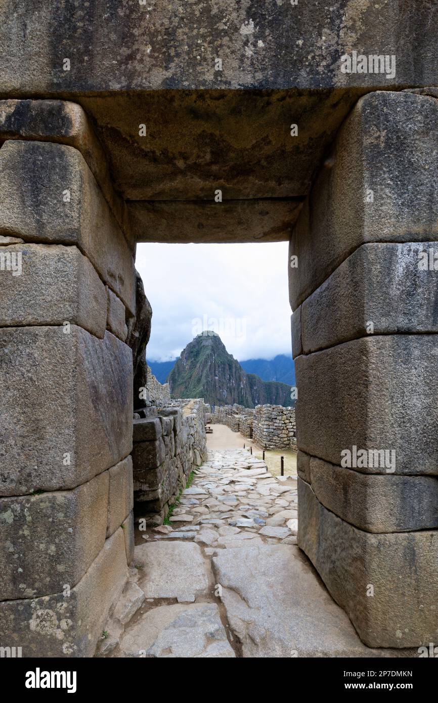 Machu Picchu, Gate in the ruined city of the Incas with the Mount ...