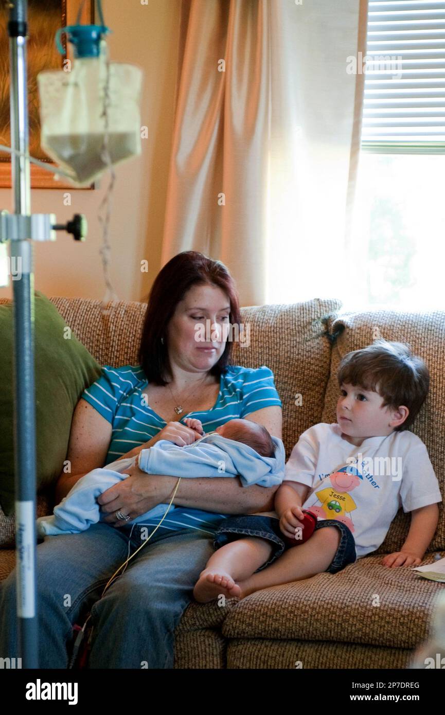 In a May 20, 2010 photo, Jesse Waksmunski sits on the couch with his ...