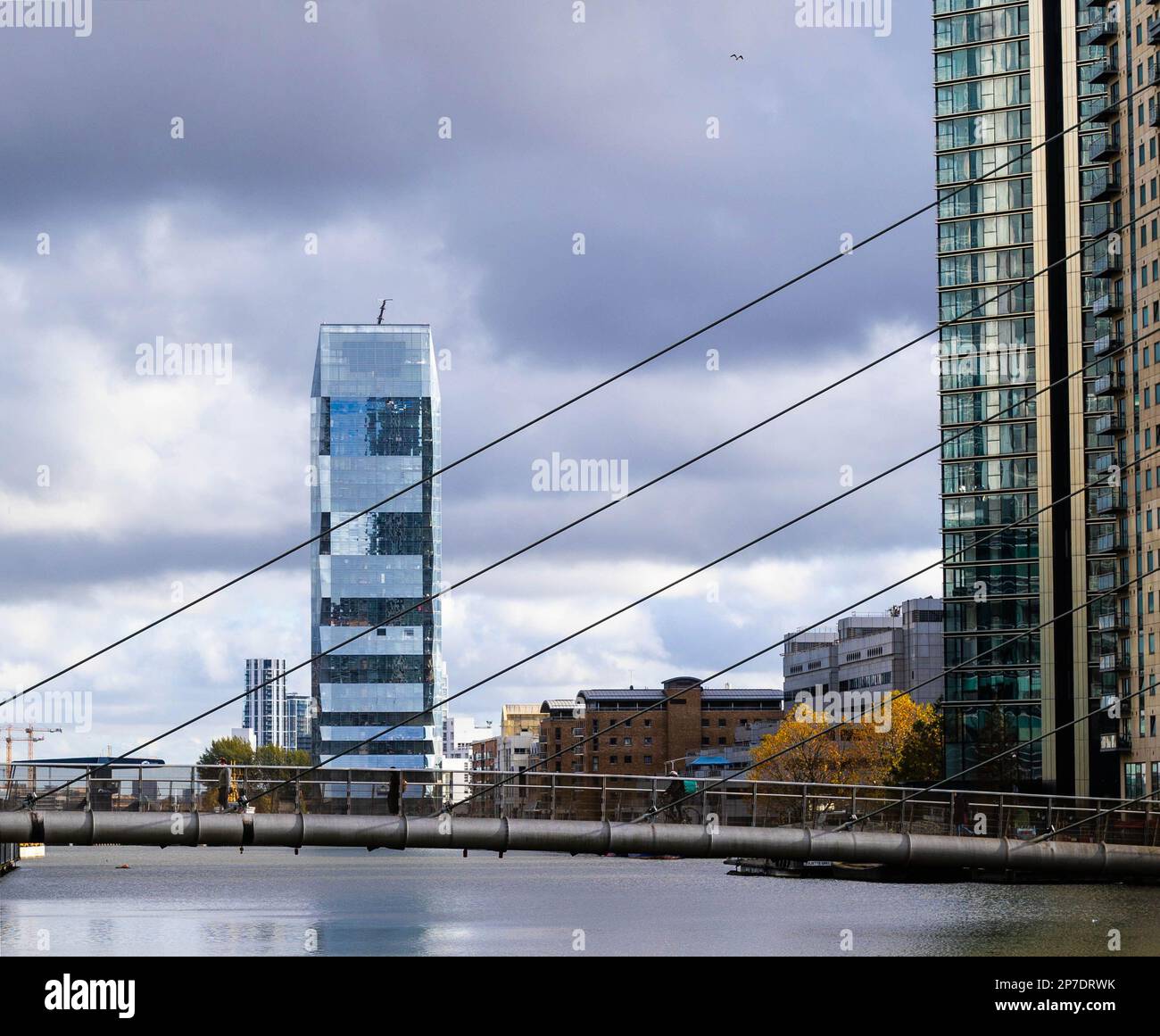 The Dollar Bay building, near to Canary Wharf, is seen over the water ...