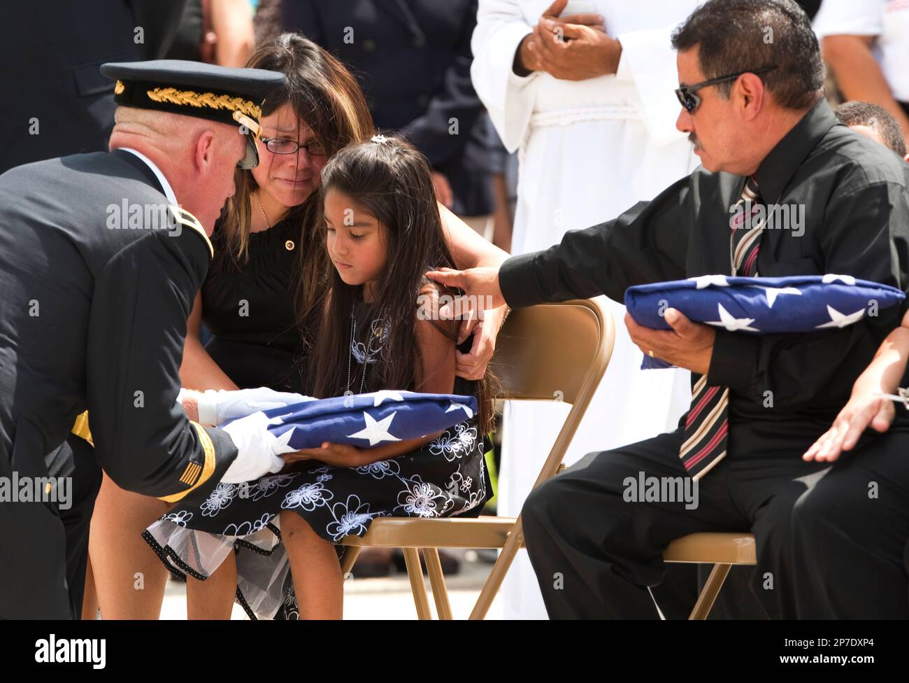 Kassandra Infante, center, is flanked by her mother, Jessica Infante ...