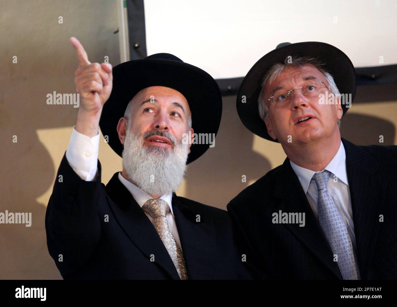 Israel’s Ashkenazi Chief Rabbi Yonah Metzger, left, points at the ...