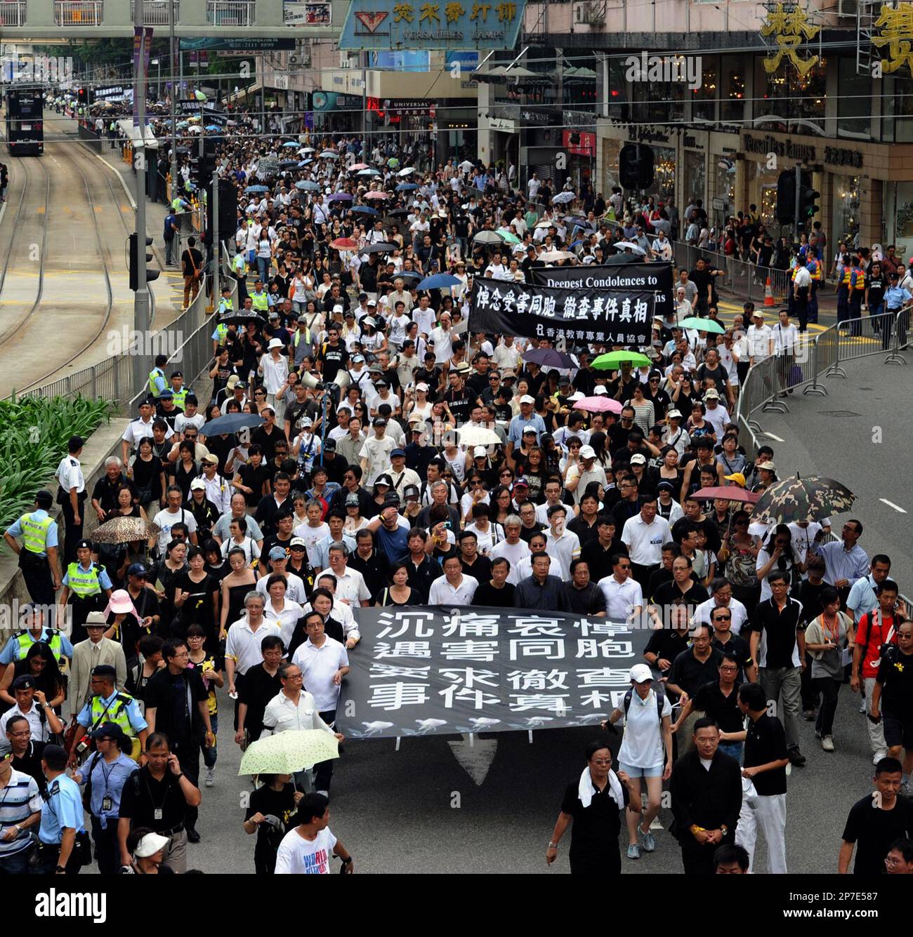 Local residents march to protest the Philippine government over a bus ...
