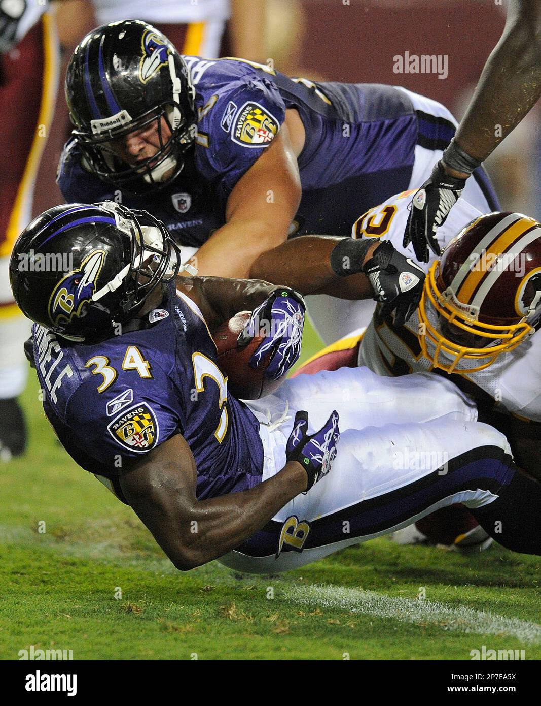 Baltimore Ravens running back Jalen Parmele (34) rolls into the end ...