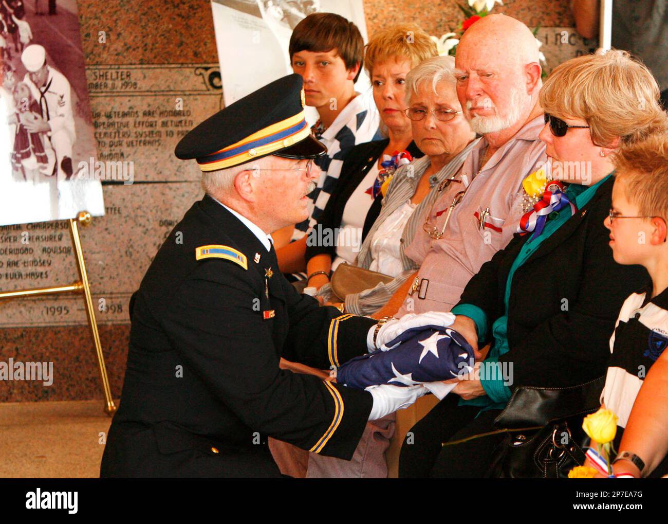 Daughter of U.S. Army Officer Donald Wann, Shannon Plaster, second from ...