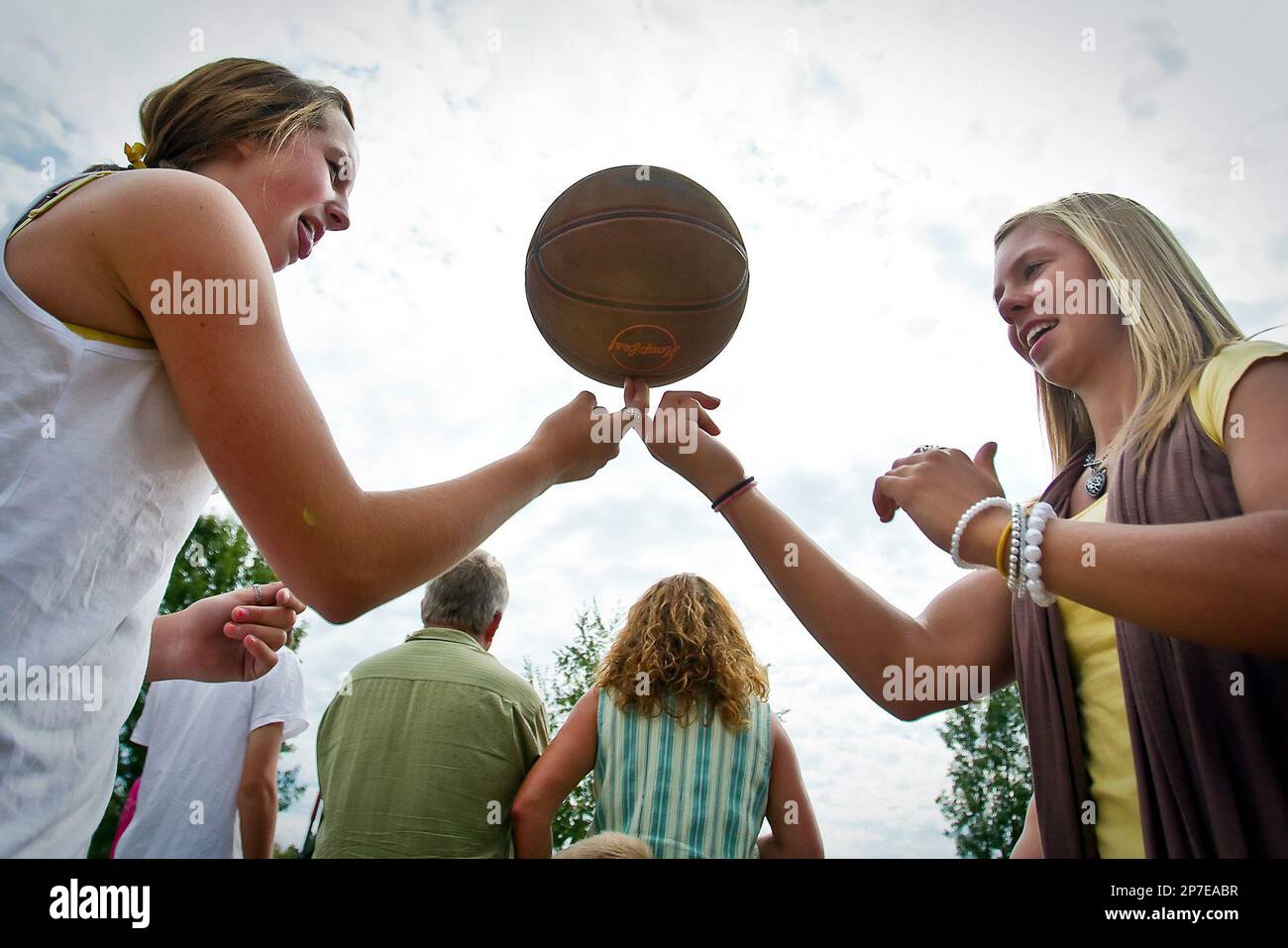 Sydni Parker, left and Madison Sumner, both 14, pass a ball to each ...