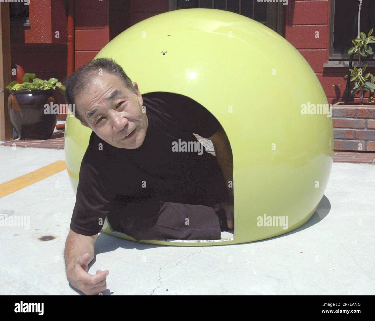 Katsuyoshi Okawa, 69, gets inside his developed Earthquake Escape ...