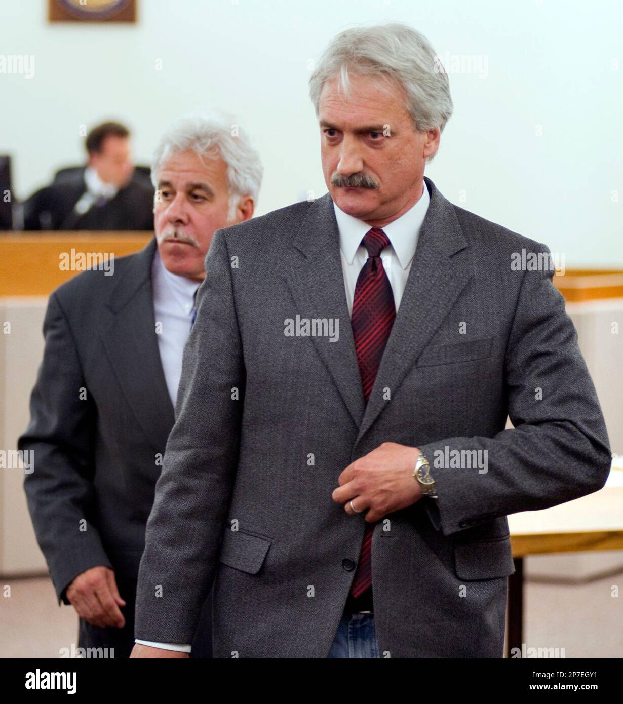 Alaska Fish and Game Commissioner Denby Lloyd, right and his attorney ...