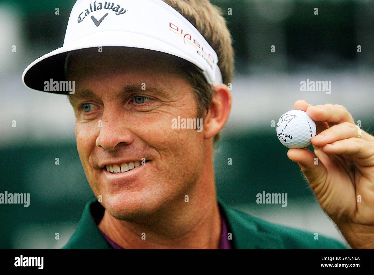 Stuart Appleby holds his ball which he signed with "59" on the 18th ...