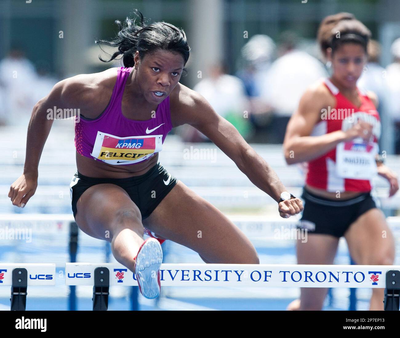 Perdita Felicien wins her heat in the women's' 400 meter hurdles during ...