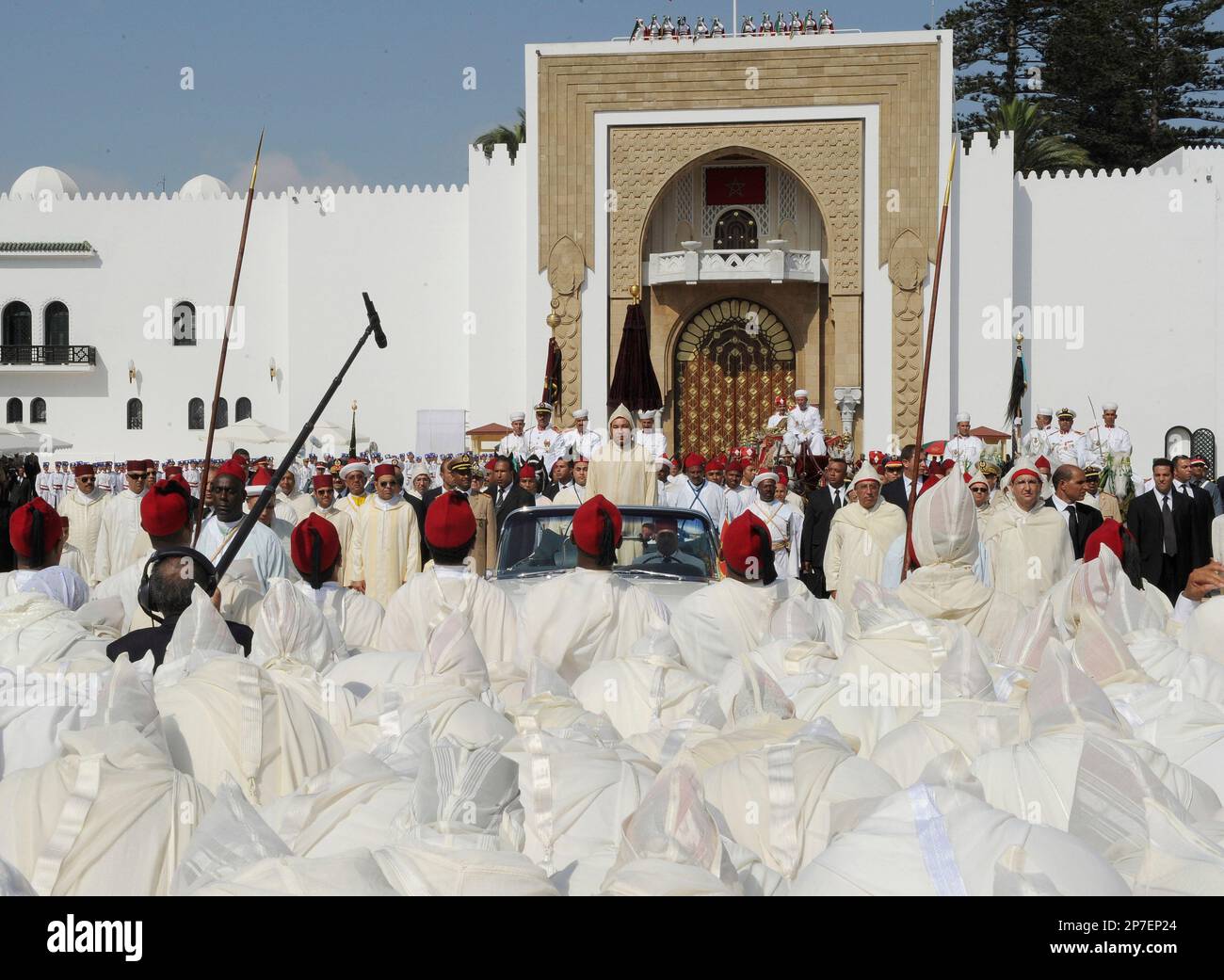 In this photo released by the Moroccan Royal Palace, Morocco's King ...