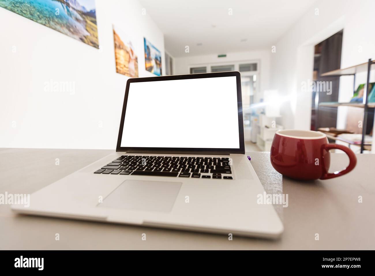 Laptop with blank screen . Home interior or office background Stock ...