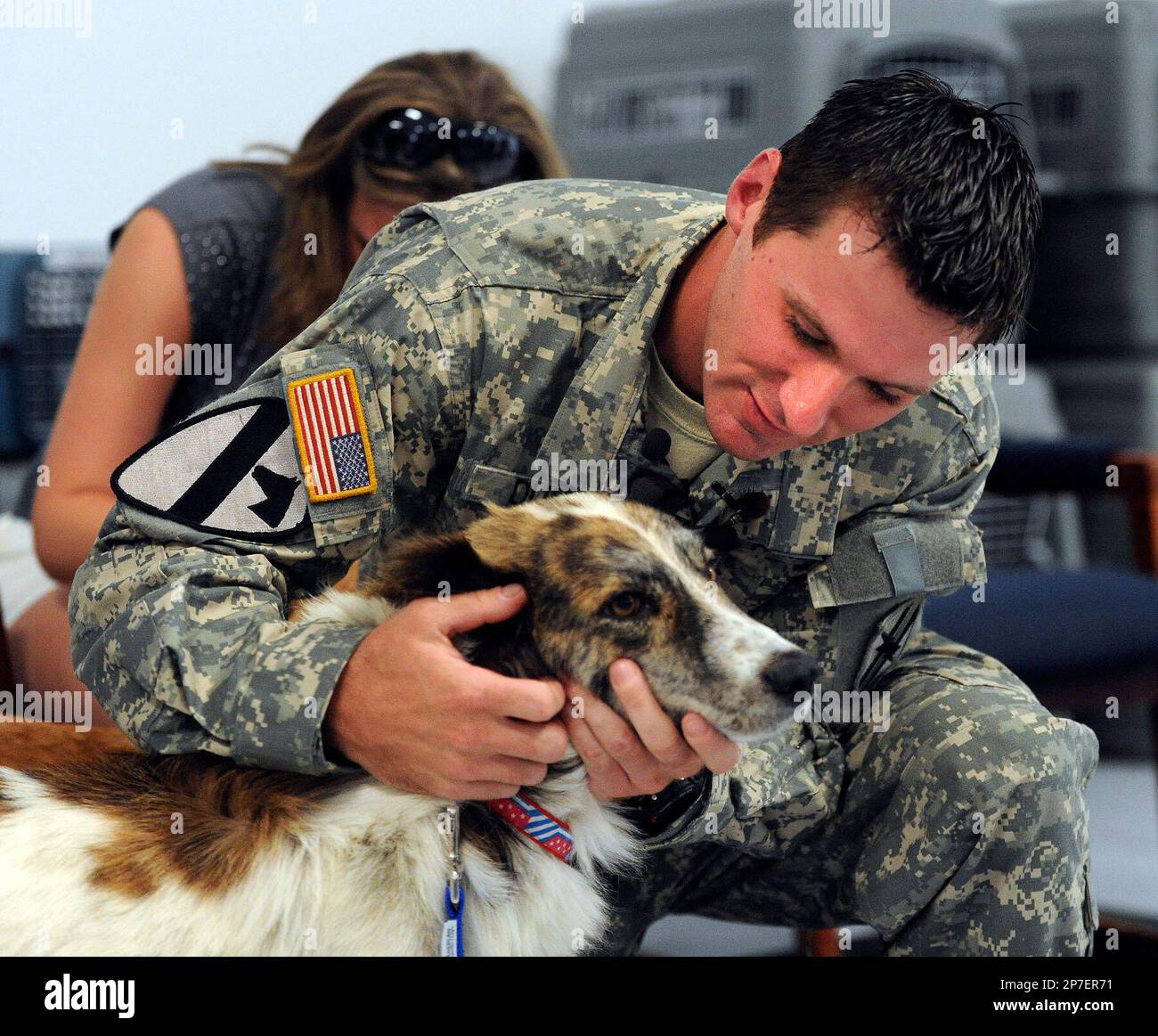 Sgt. Christopher Duke reunites with dog Rufus at PetAirways on Thursday ...
