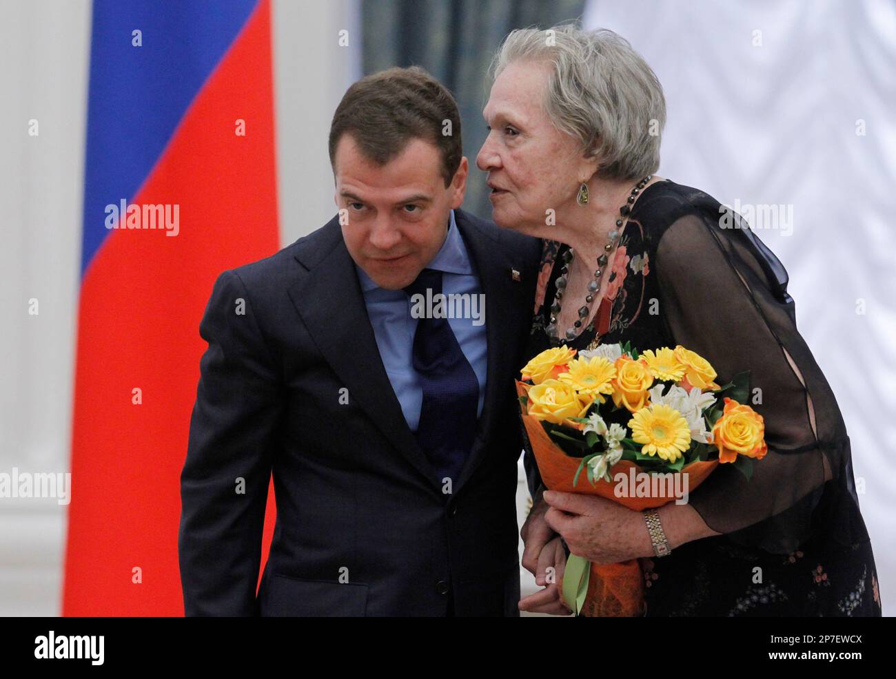 Russian President Dmitry Medvedev, left, listens to actress Rimma ...