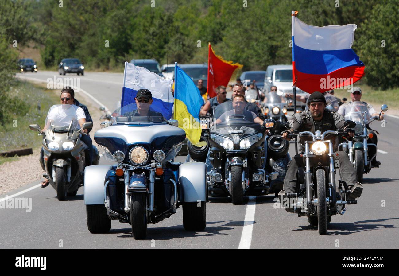 Russian Prime Minister Vladimir Putin, left, rides Harley Davidson ...