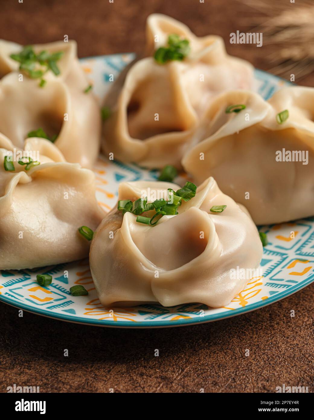 Portion of steamed tatar manti dumplings Stock Photo - Alamy
