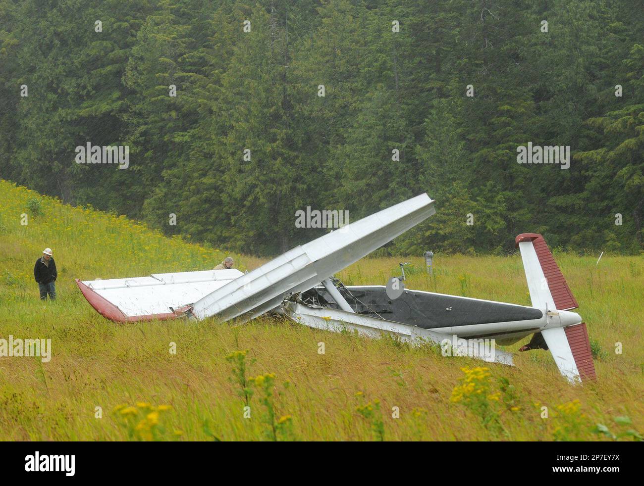 Ray Cowan, left wearing hard hat, and Dave Hull, by wing, Chief of the ...
