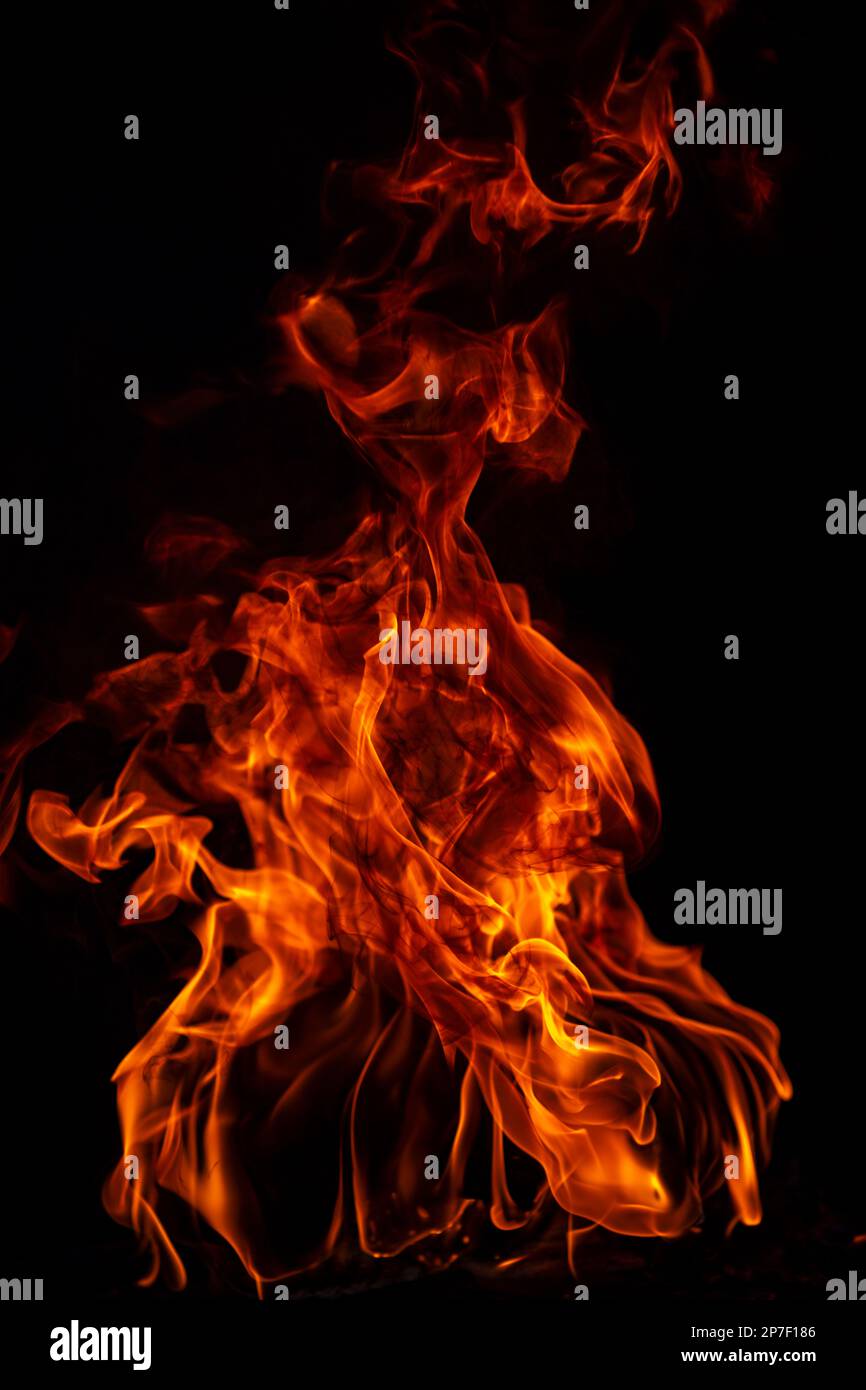 Blaze burning fire flame on art texture background Stock Photo - Alamy