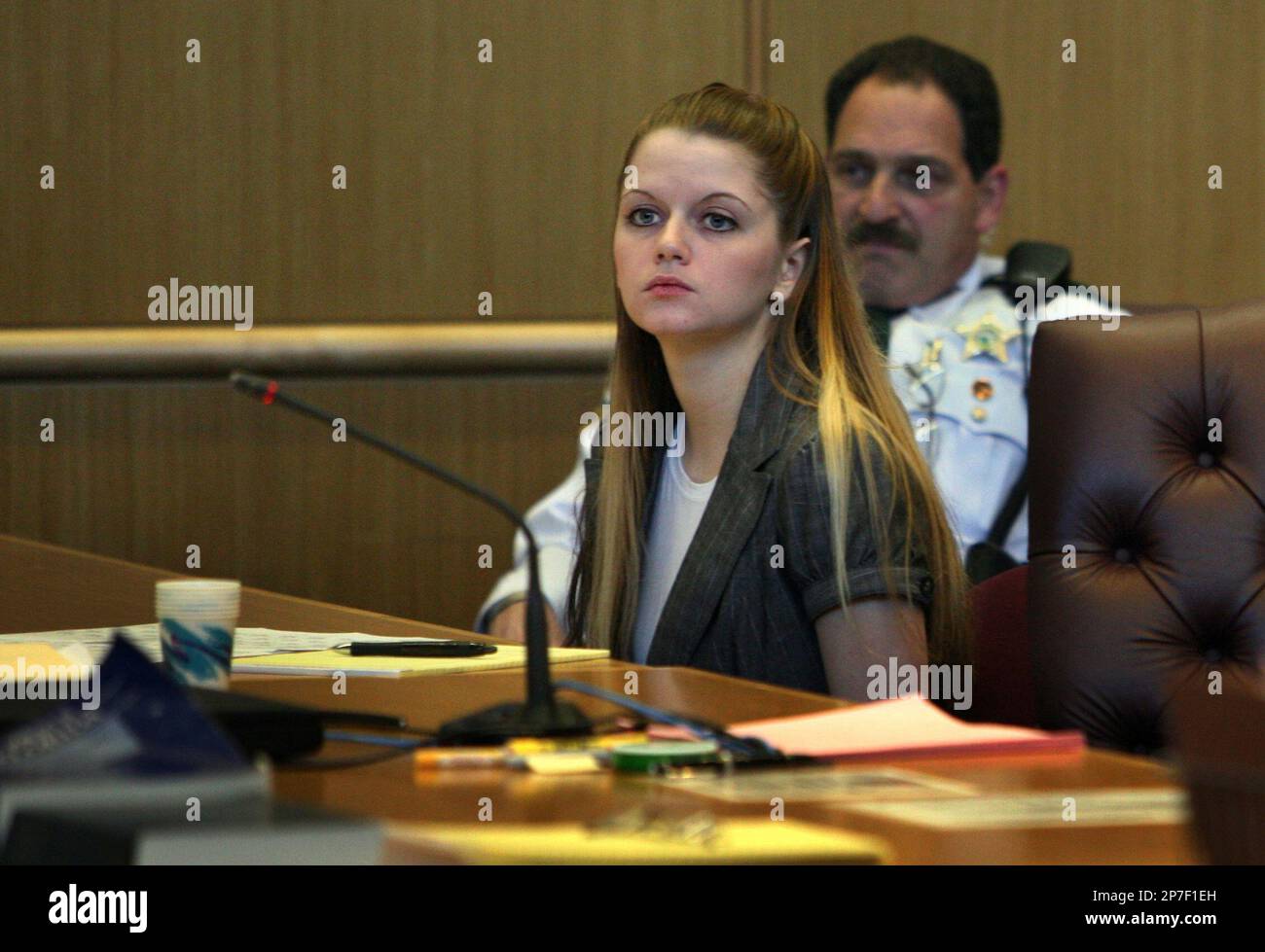 Rachel Wade looks at the potential jurors before she goes on trial at ...