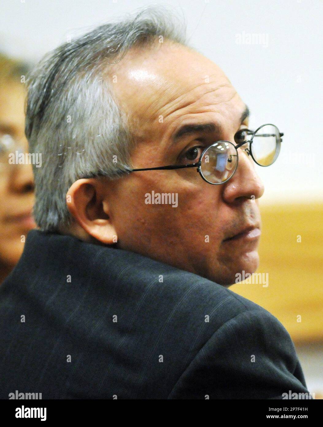 John Sandoval looks at the prosecution during his murder trial on ...