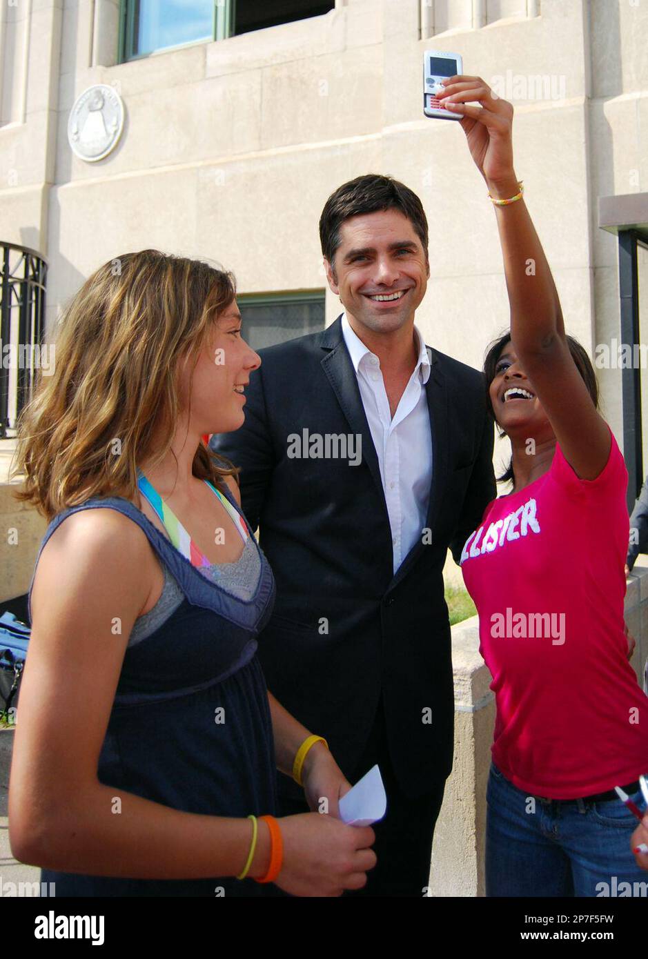Actor John Stamos meets with fans outside of the federal building in ...