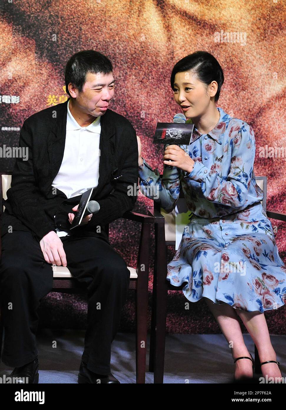 Chinese director Feng Xiaogang and his wife, actress Xu Fan attend the ...