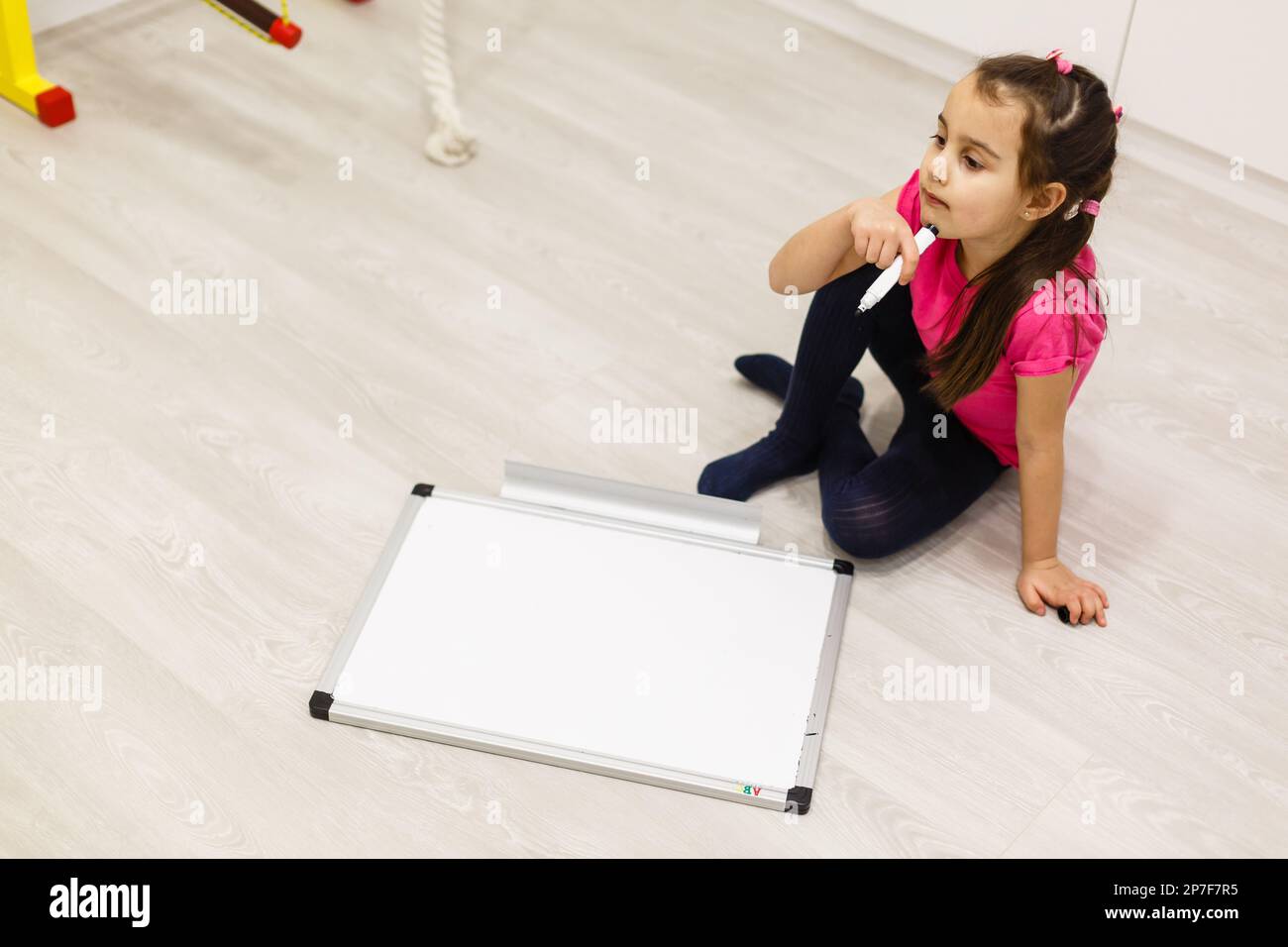 little girl writing on the white board, schooling background Stock ...