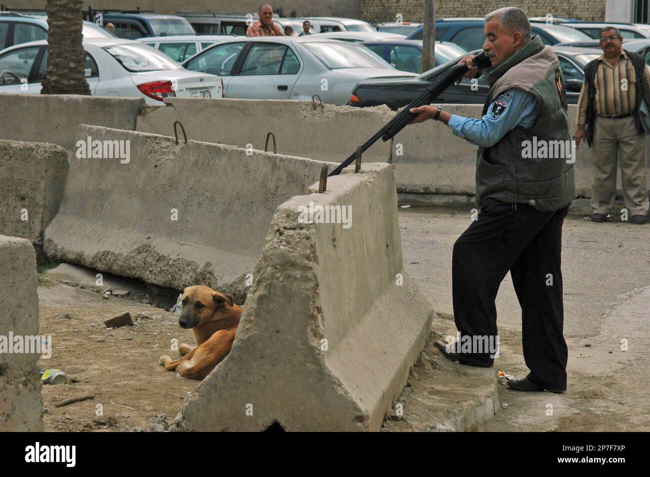 FILE - In this Nov. 23, 2008 file photo, Iraqi police officer Qassim ...