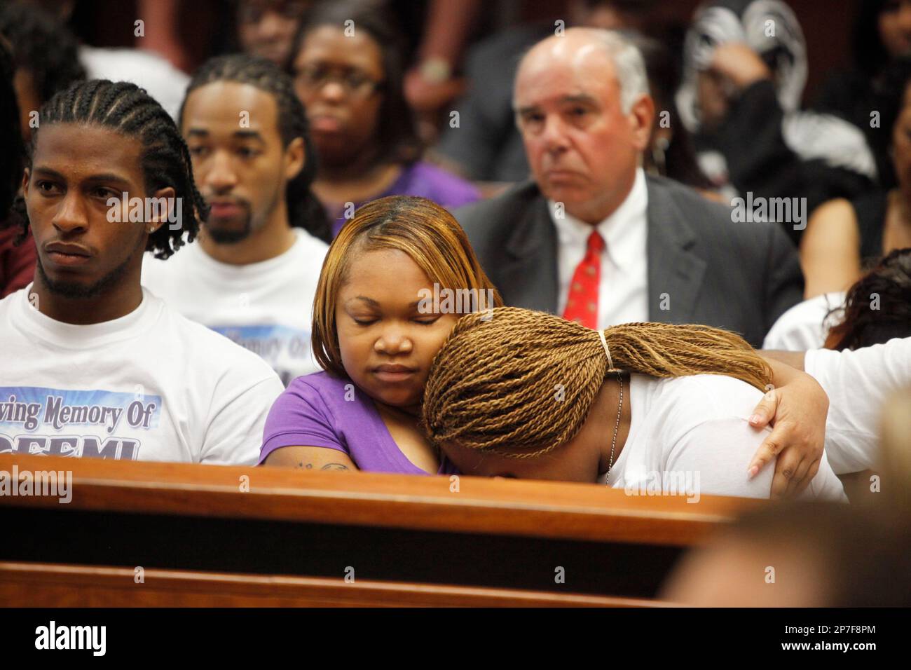 Jasmine Hightower, center, the younger sister of murder victim Iofema ...