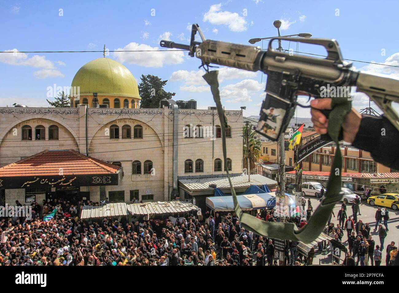 Nablus, Palestine. 08th Mar, 2023. A Palestinian gunman shoots in the ...