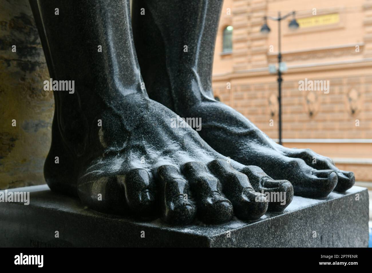 Toes of the Atlas statue, tourist omen to make a wish. Classic ...