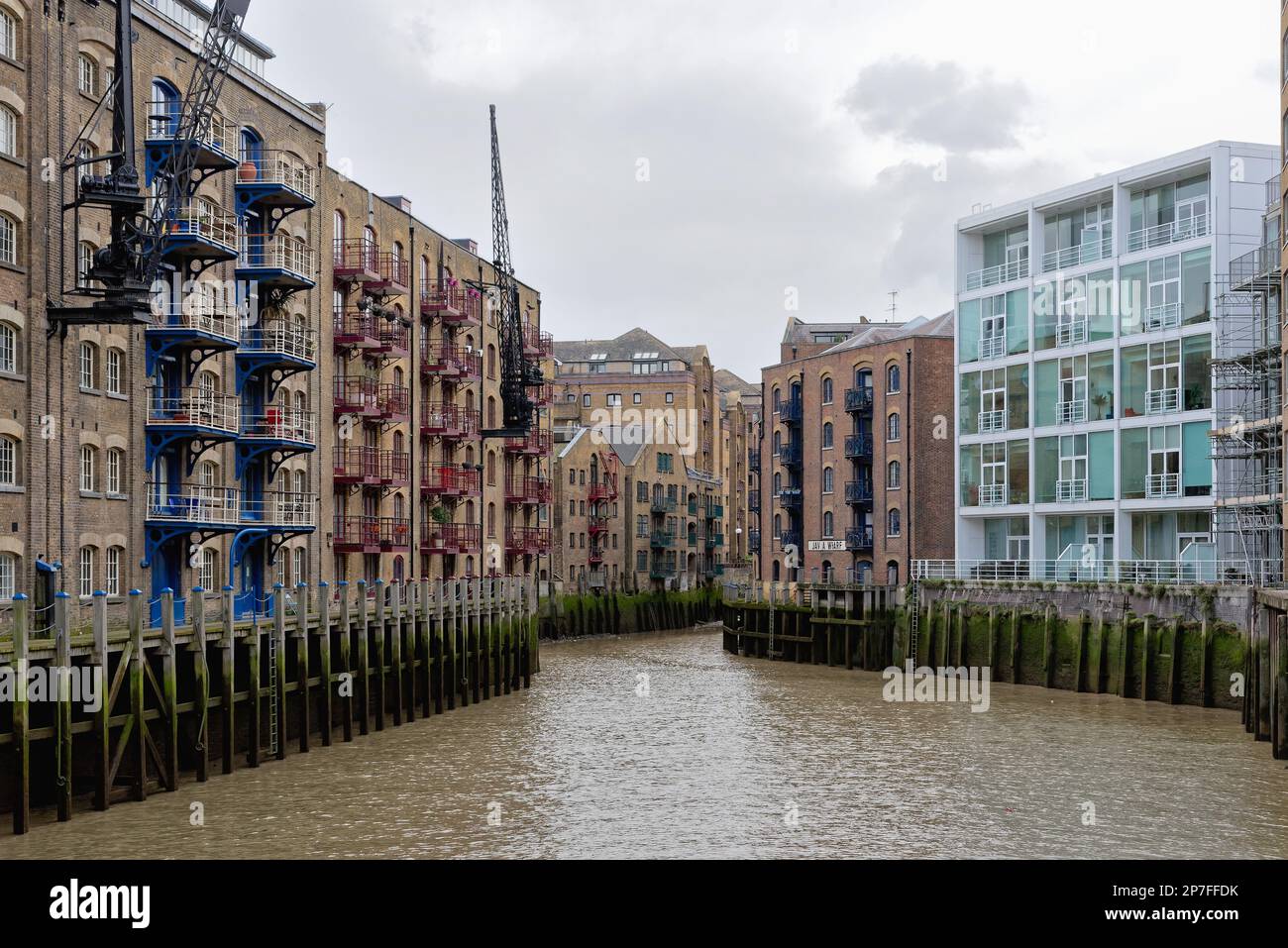 The Grade Two listed buildings of Java Wharf contrasting against a ...