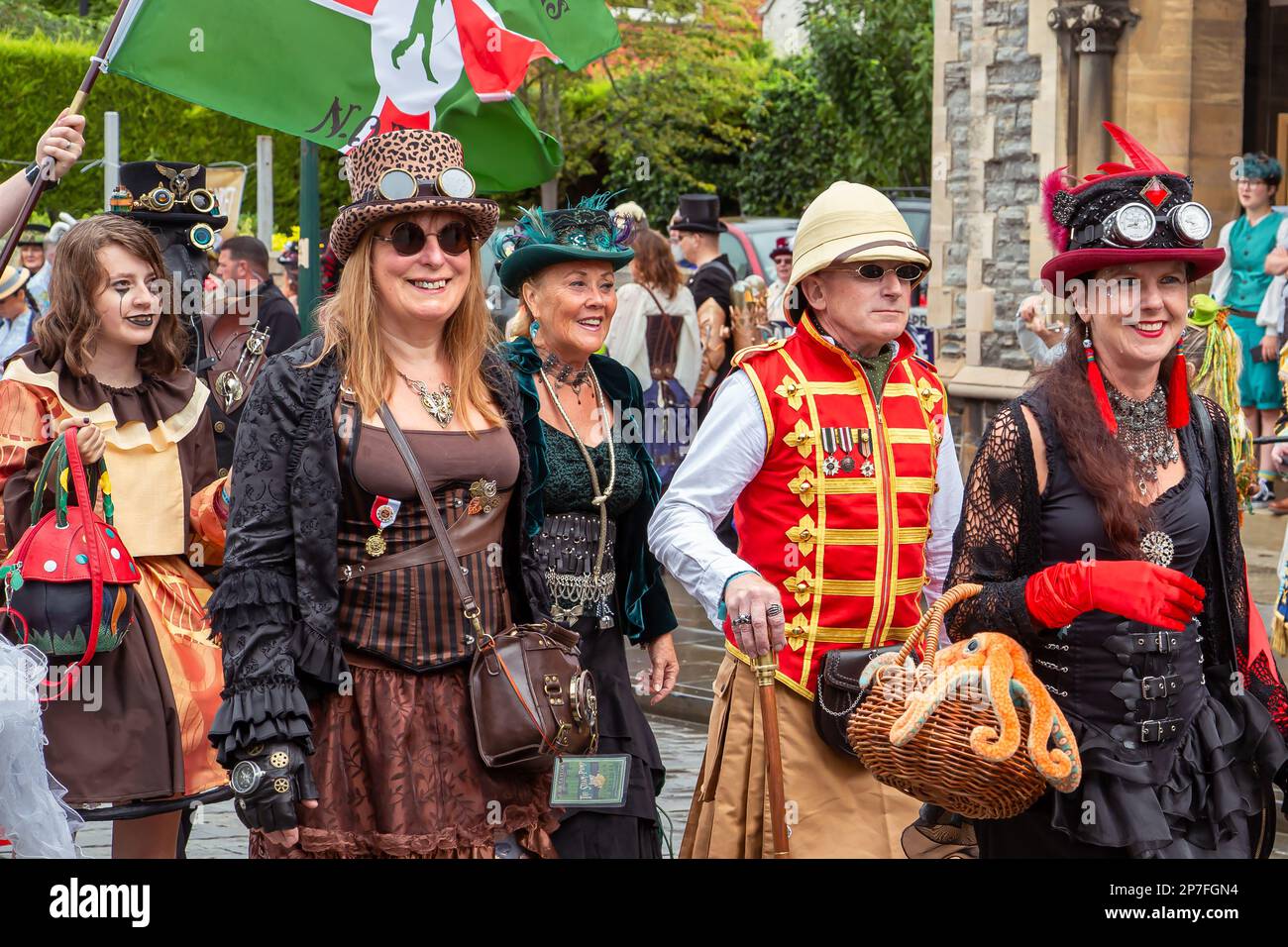 A group of steampunks walking in procession along a street Stock Photo ...