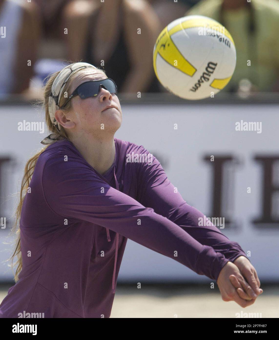 Summer Ross makes a return shot as she and her partner Petia Yanchulova ...