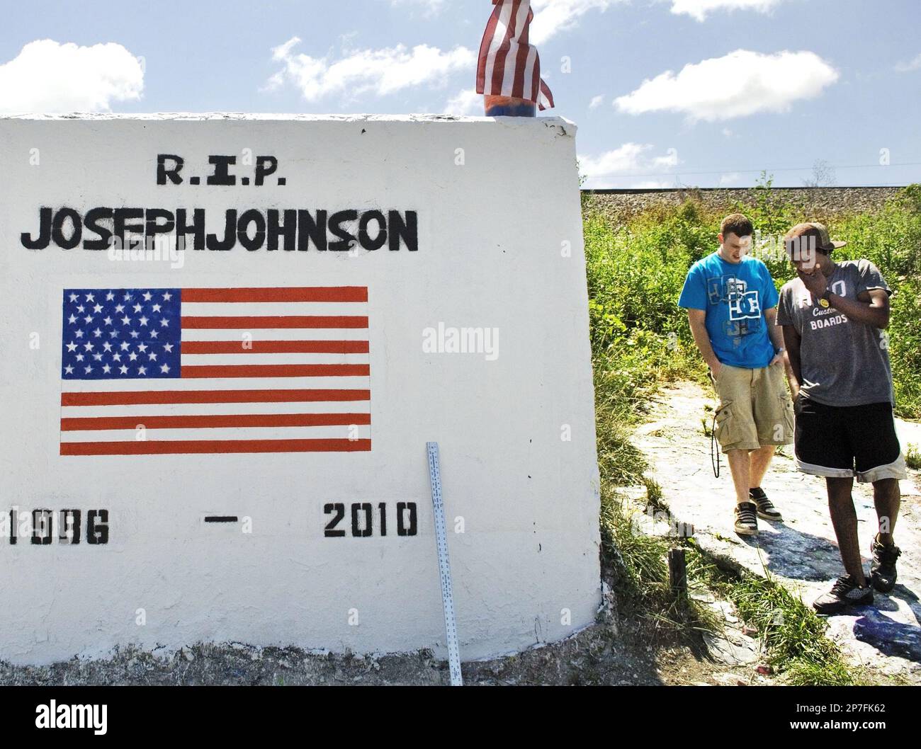 In this undated photo Ashley Patterson, right, of Flint, gets emotional ...