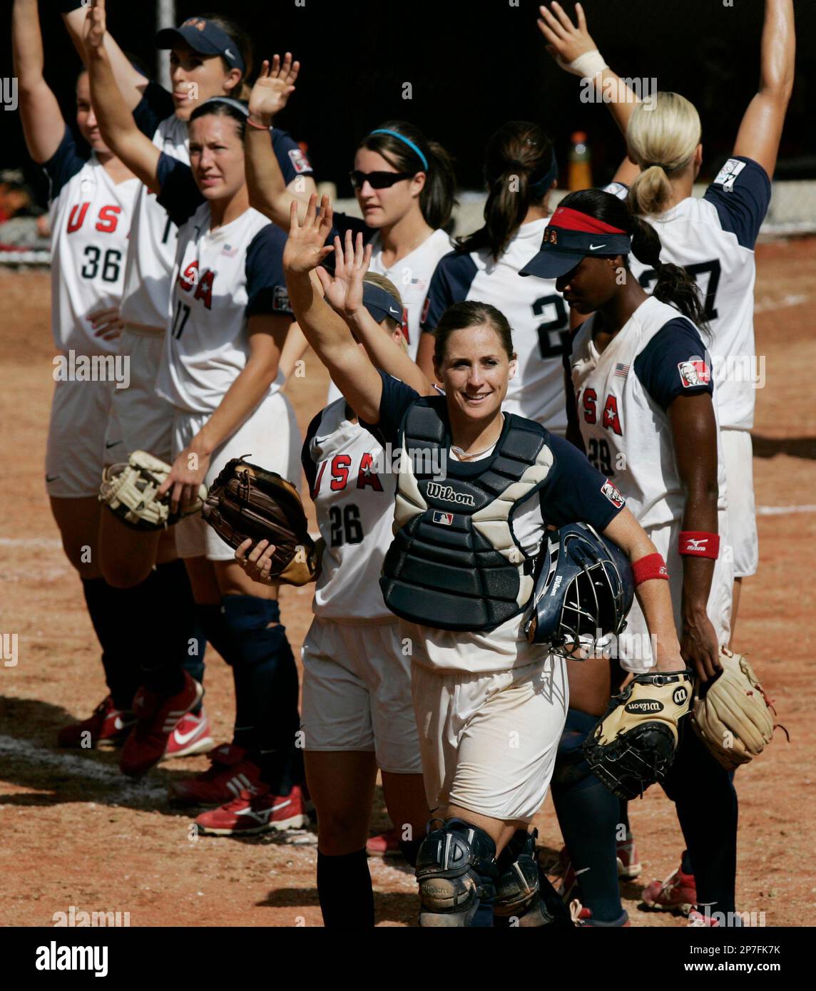 U.S. catcher Lauren Lappin (37) at front, and her teammates of the U.S ...