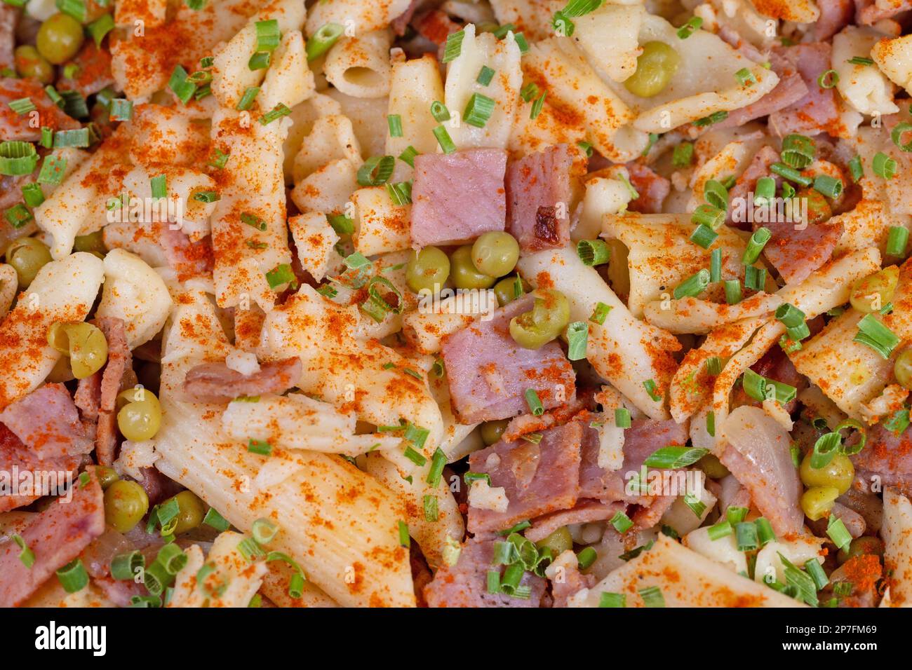 Noodle pan, ham noodles in a closeup Stock Photo - Alamy