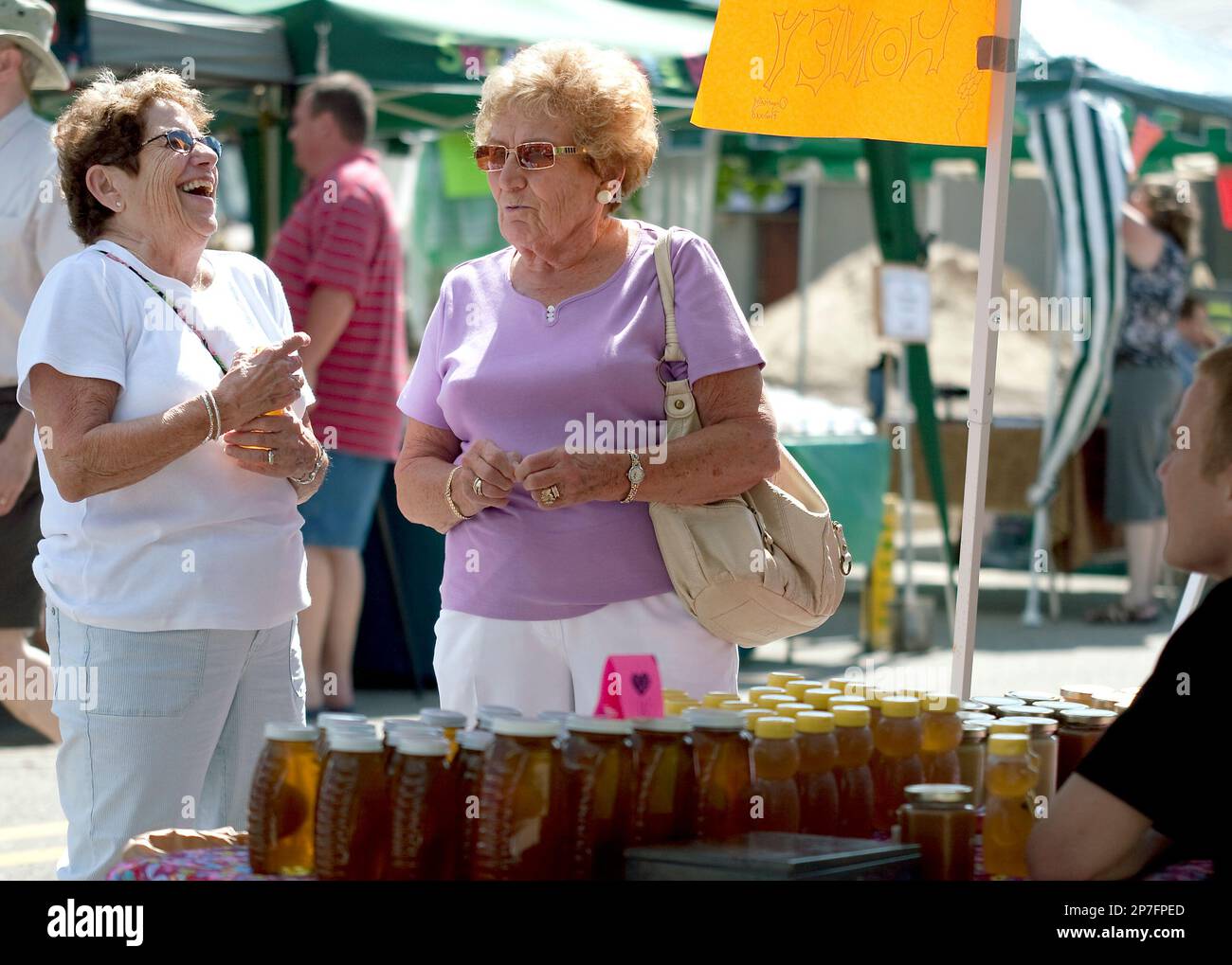From left, Pat Dowling of Grand Blanc laughs with Liz Walker of Grand ...
