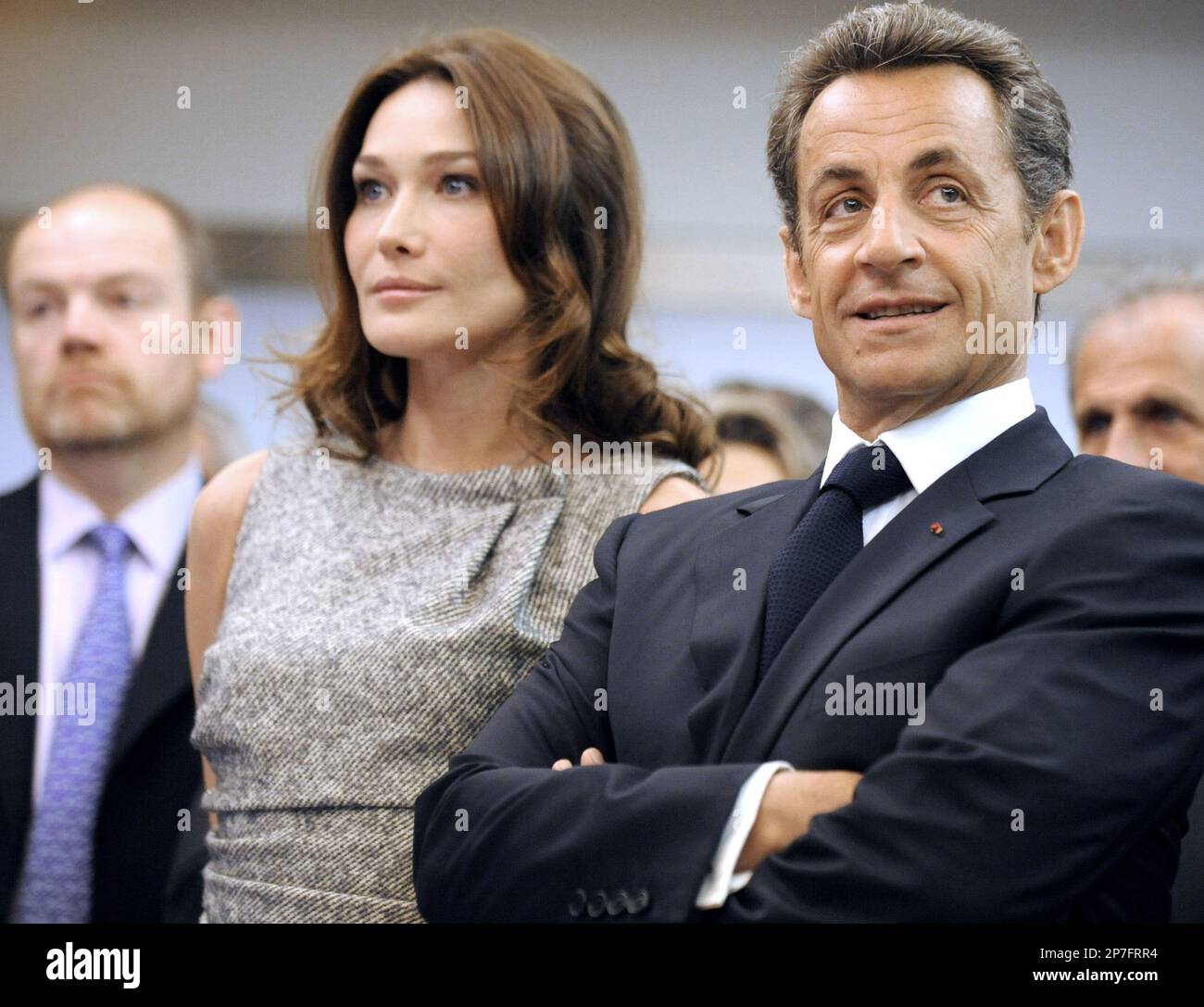 French President Nicolas Sarkozy, right, and his wife Carla Bruni ...