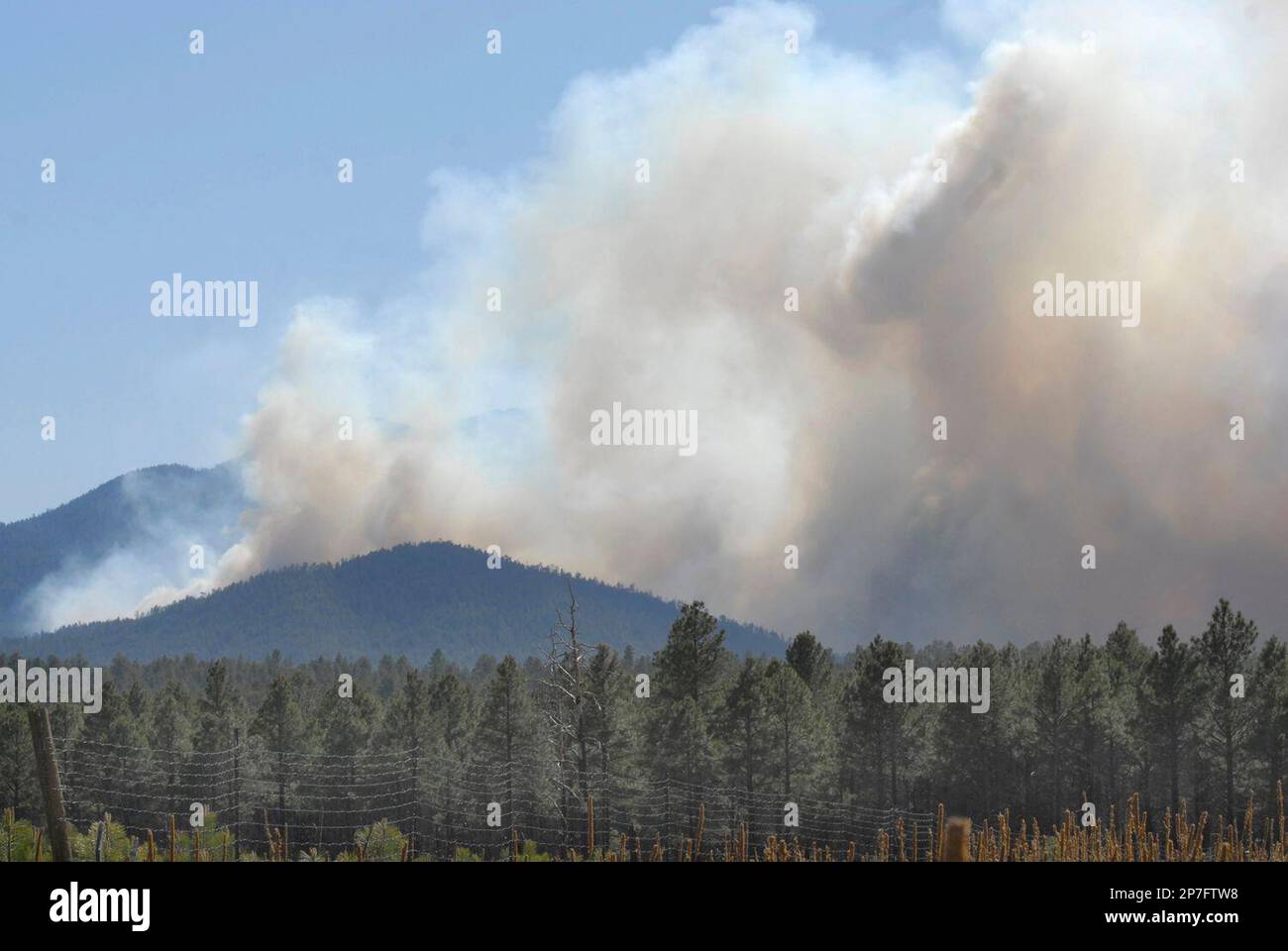 Smoke rises from the Eagle Rock fire, 25 miles northwest Flagstaff ...