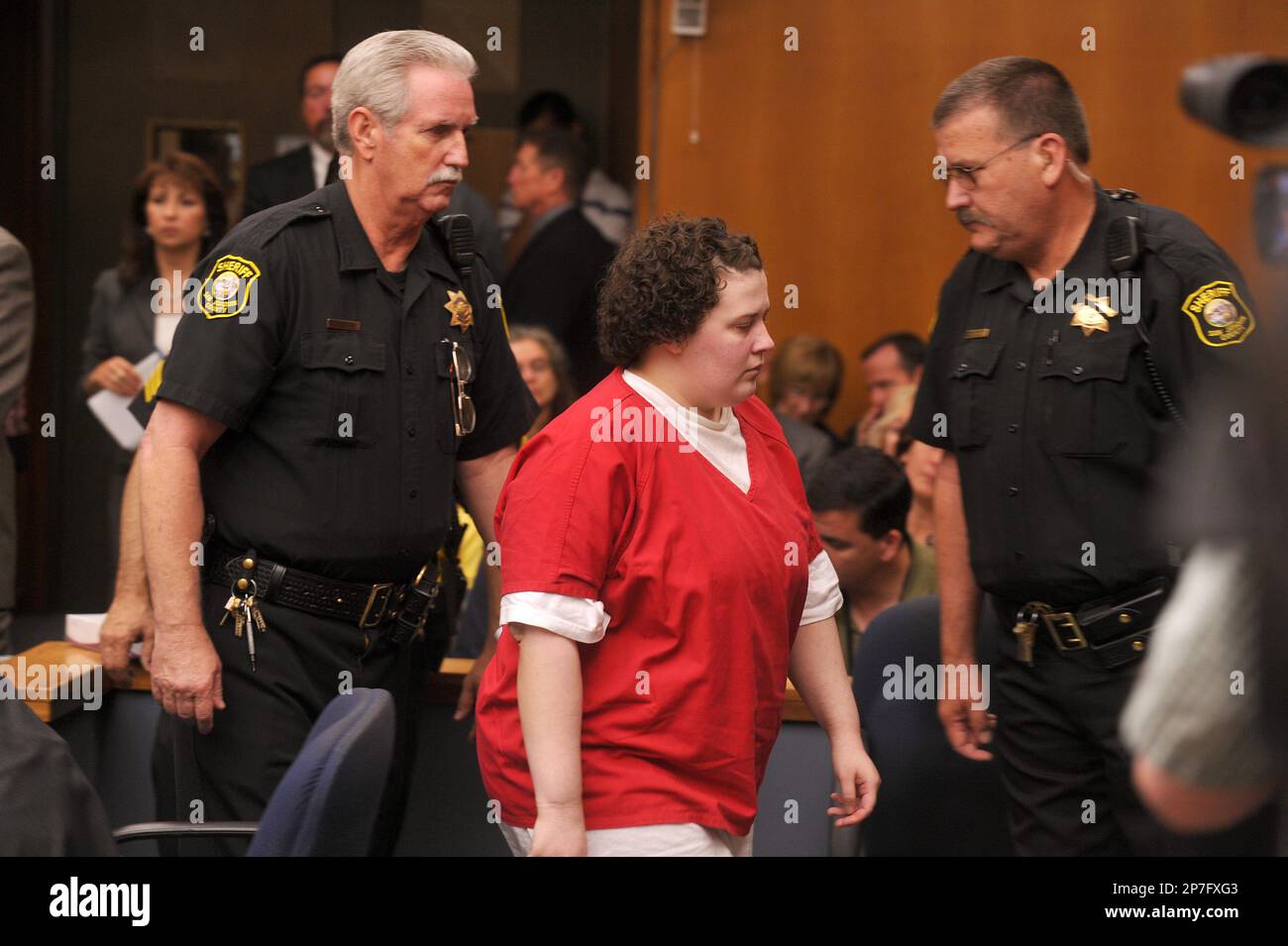 Melissa Huckaby is escorted from the courtroom after her sentencing in ...