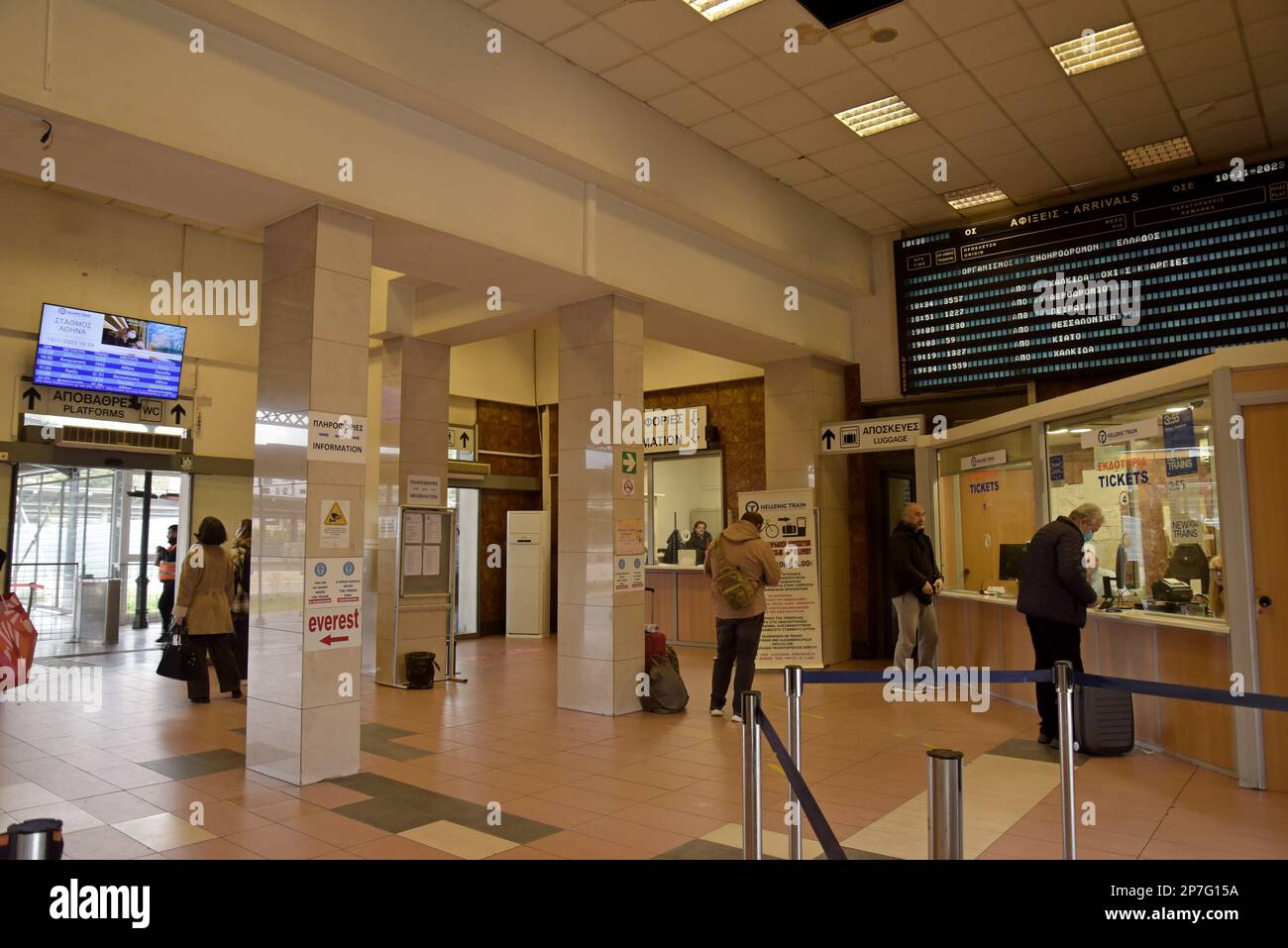 Passengers buying tickets in the main ticket hall at Athens Central ...