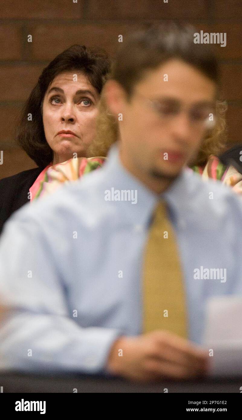 Kathy Potter, widow of Melvyn J. Otterstrom, listens as her son, Jason ...
